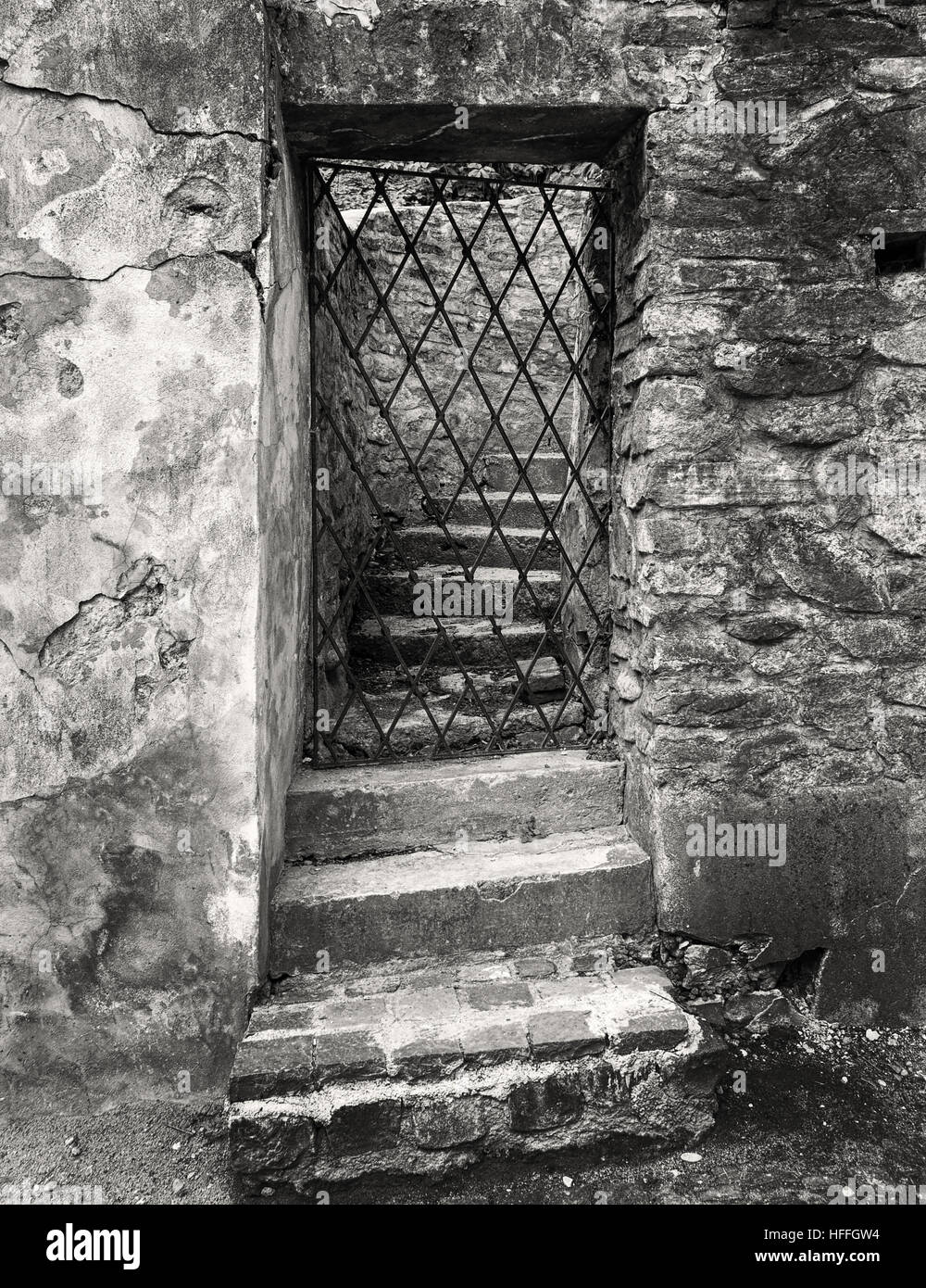 Black and white gate in the wall with textures and background Stock ...
