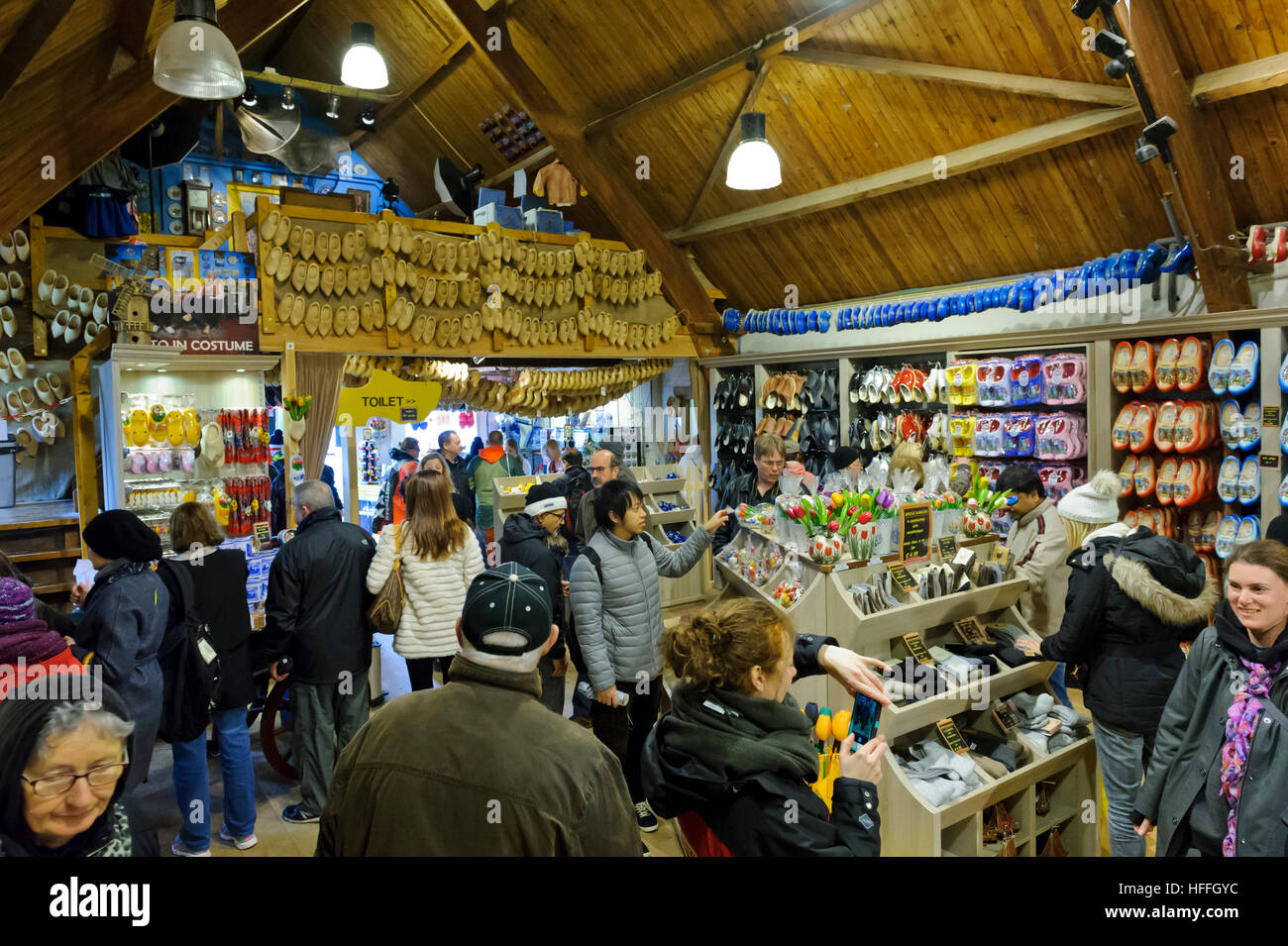 Visitors shopping inside Klompenmakerij clogs factory in Holland ...