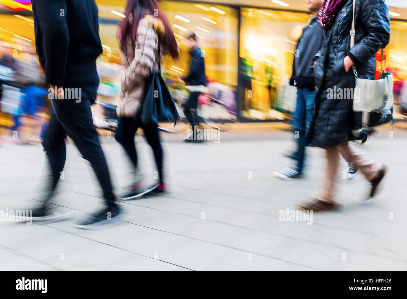 people walking on a shopping street with camera made motion blur Stock ...
