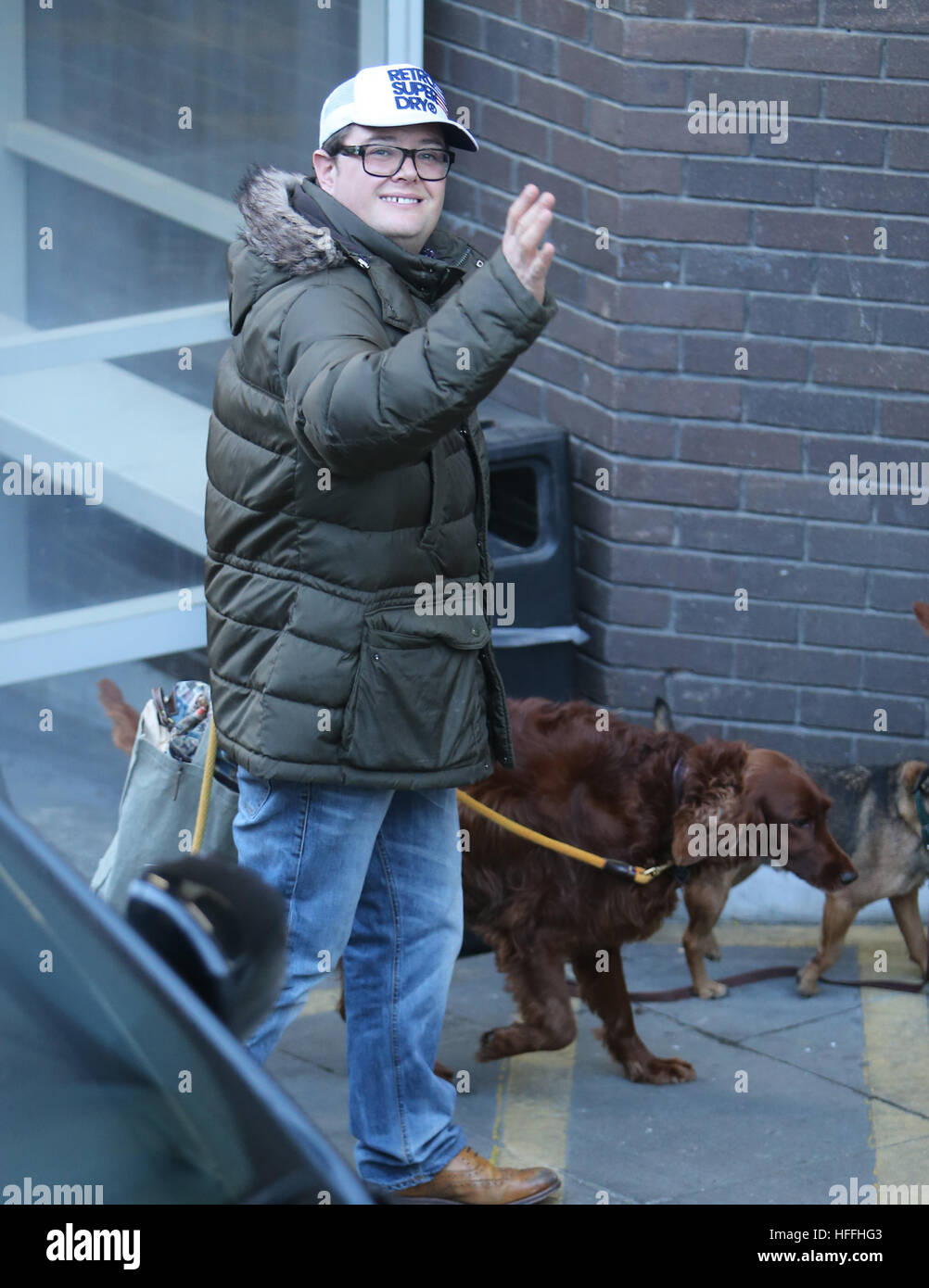 Alan Carr and his three dogs outside ITV Studios Featuring: Alan Carr ...