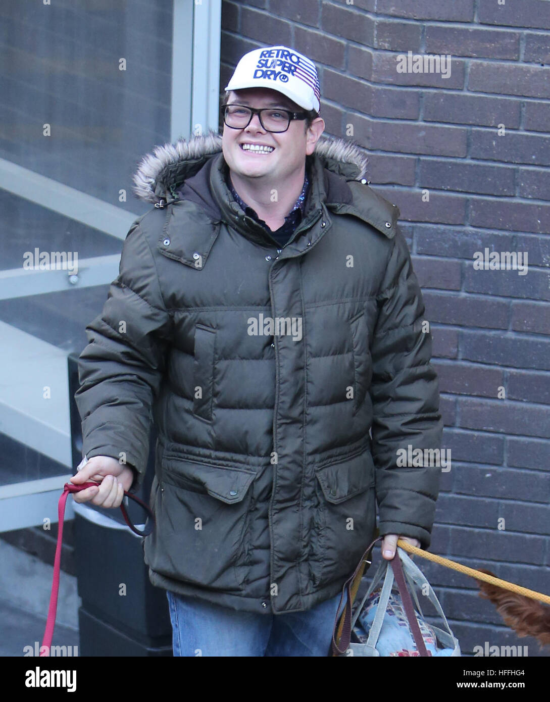 Alan Carr and his three dogs outside ITV Studios Featuring: Alan Carr ...