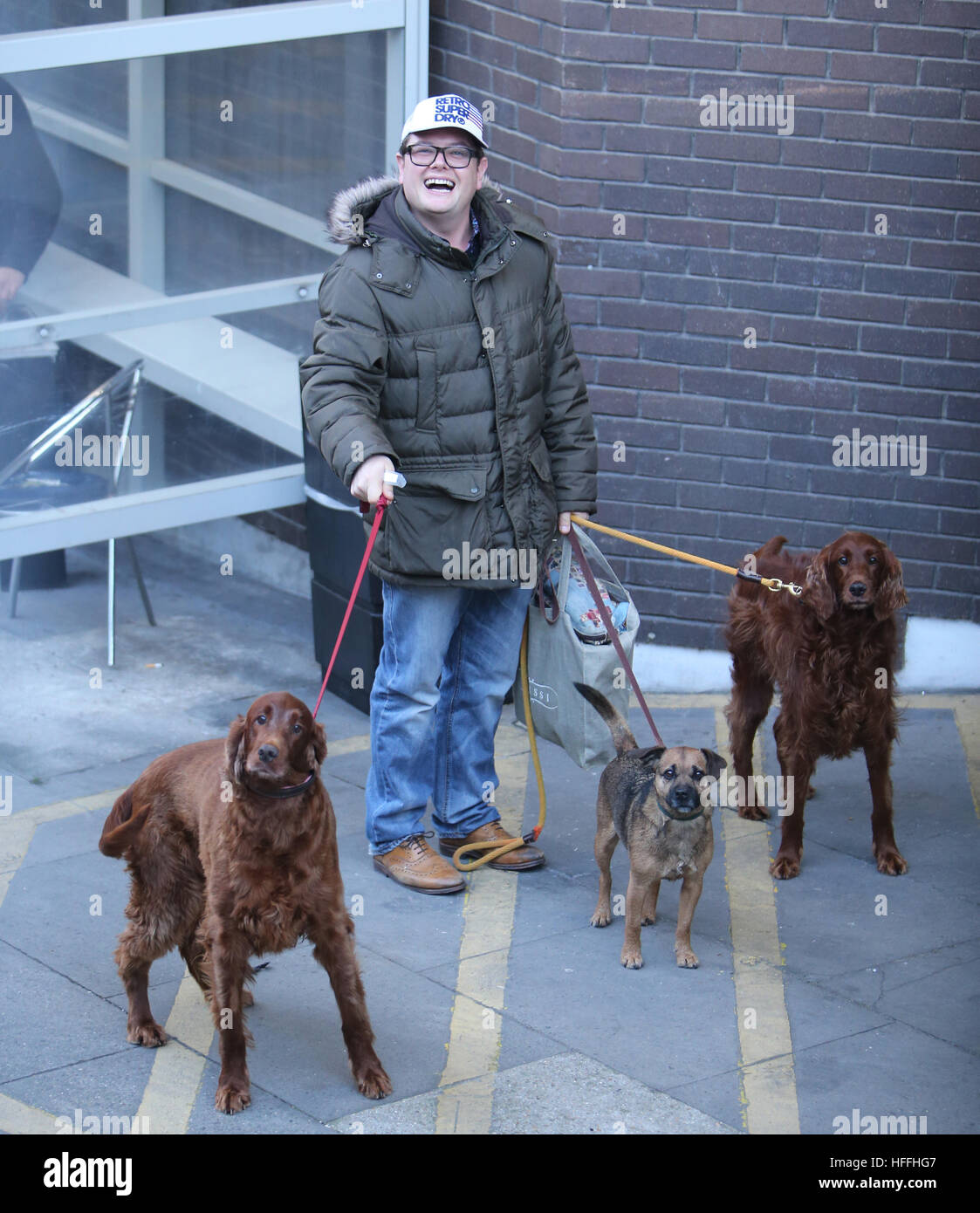 Alan Carr and his three dogs outside ITV Studios Featuring: Alan Carr ...