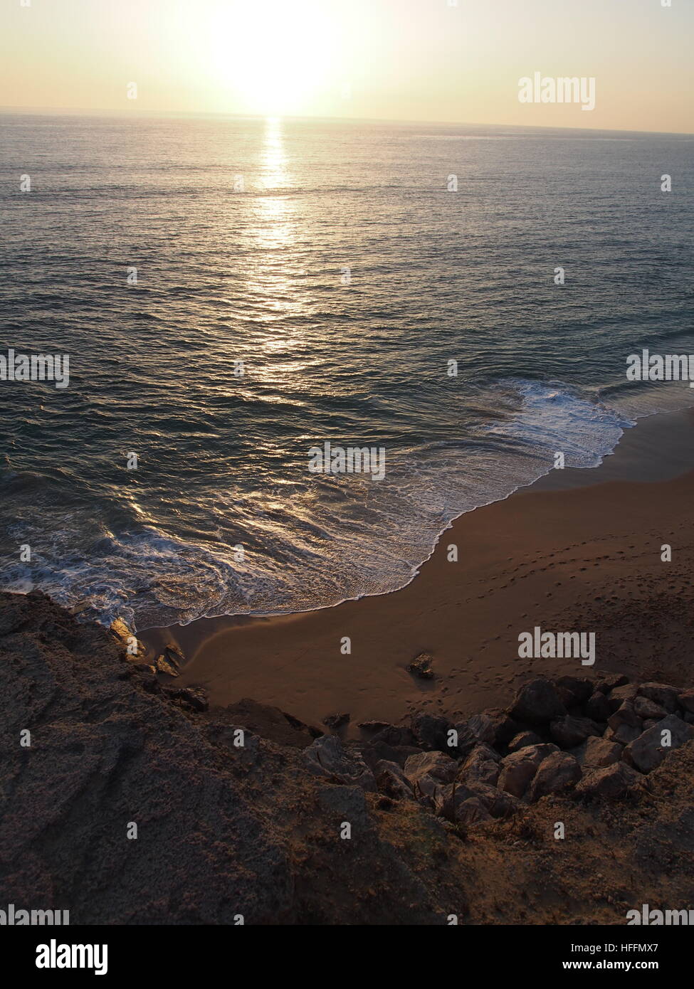 waves on a smooth beach Stock Photo - Alamy