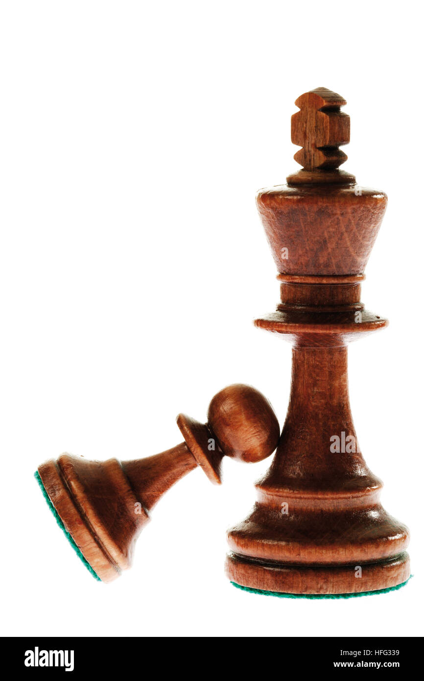 Chess pieces: brown pawn and king Stock Photo - Alamy