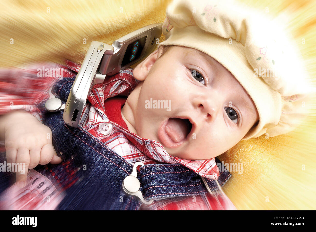 Baby with mobile phone Stock Photo - Alamy