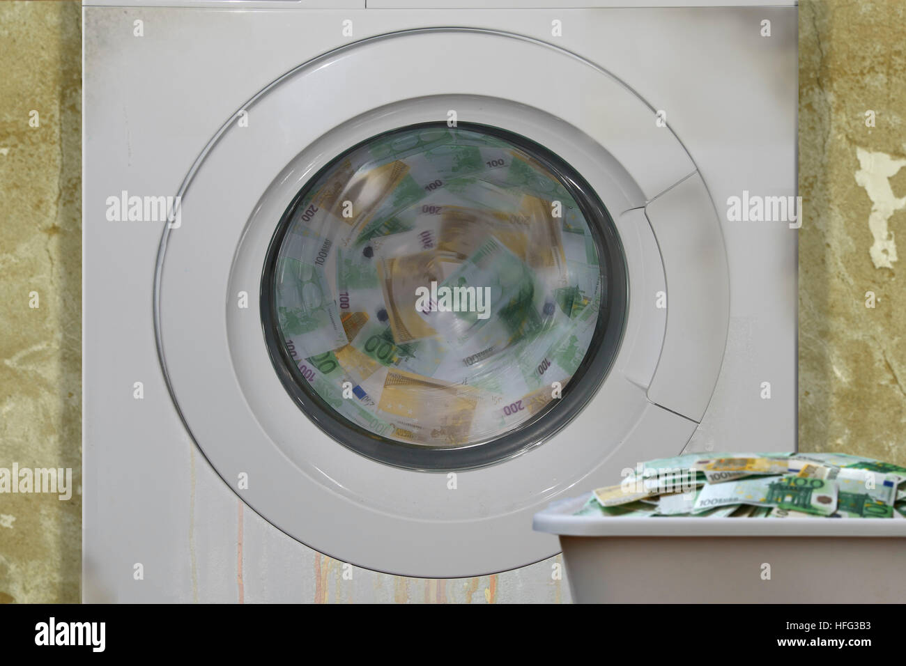 Symbolic, money laundering, money washing in a washing machine Stock ...