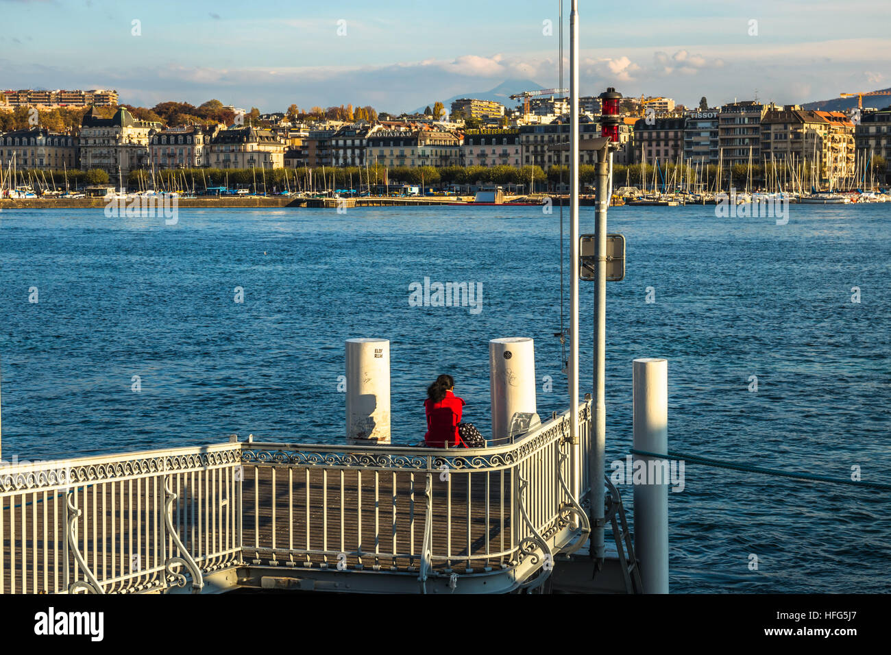 Lonely girl in Geneva lake Stock Photo - Alamy