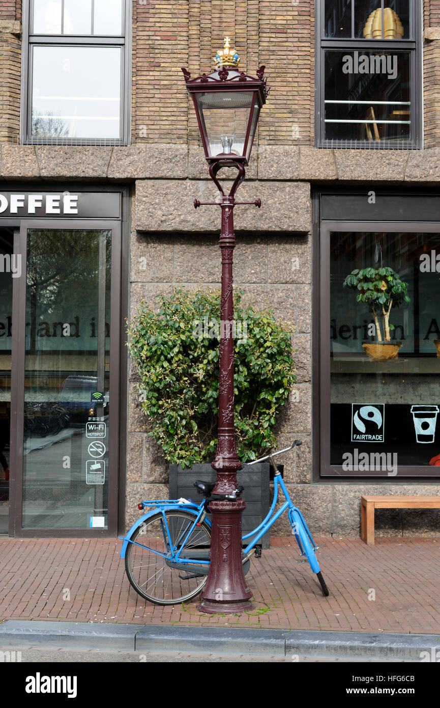 Bike leaning against post hi-res stock photography and images - Alamy