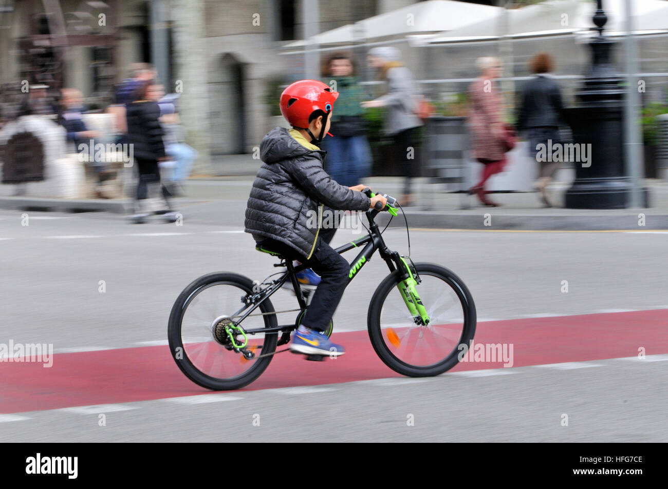 Boy on a bicycle Stock Photo - Alamy