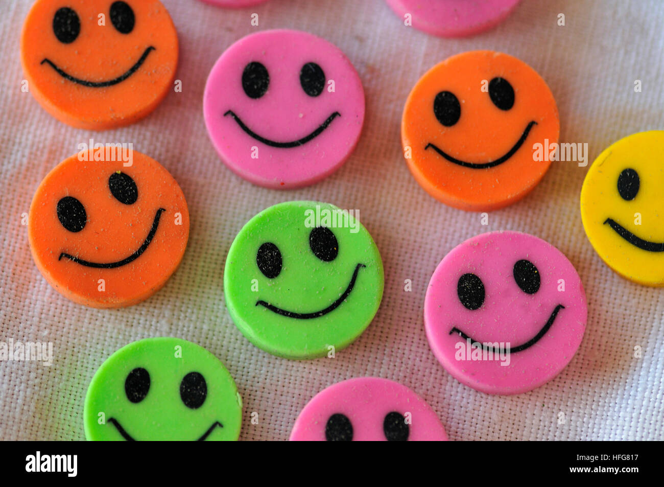 Happy colored rubbers Stock Photo - Alamy
