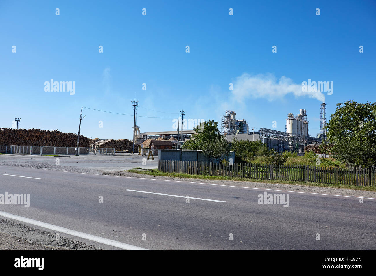 Factory with smoking chimneys hi-res stock photography and images - Alamy