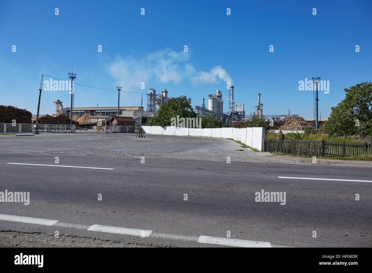 Factory with smoking chimneys hi-res stock photography and images - Alamy