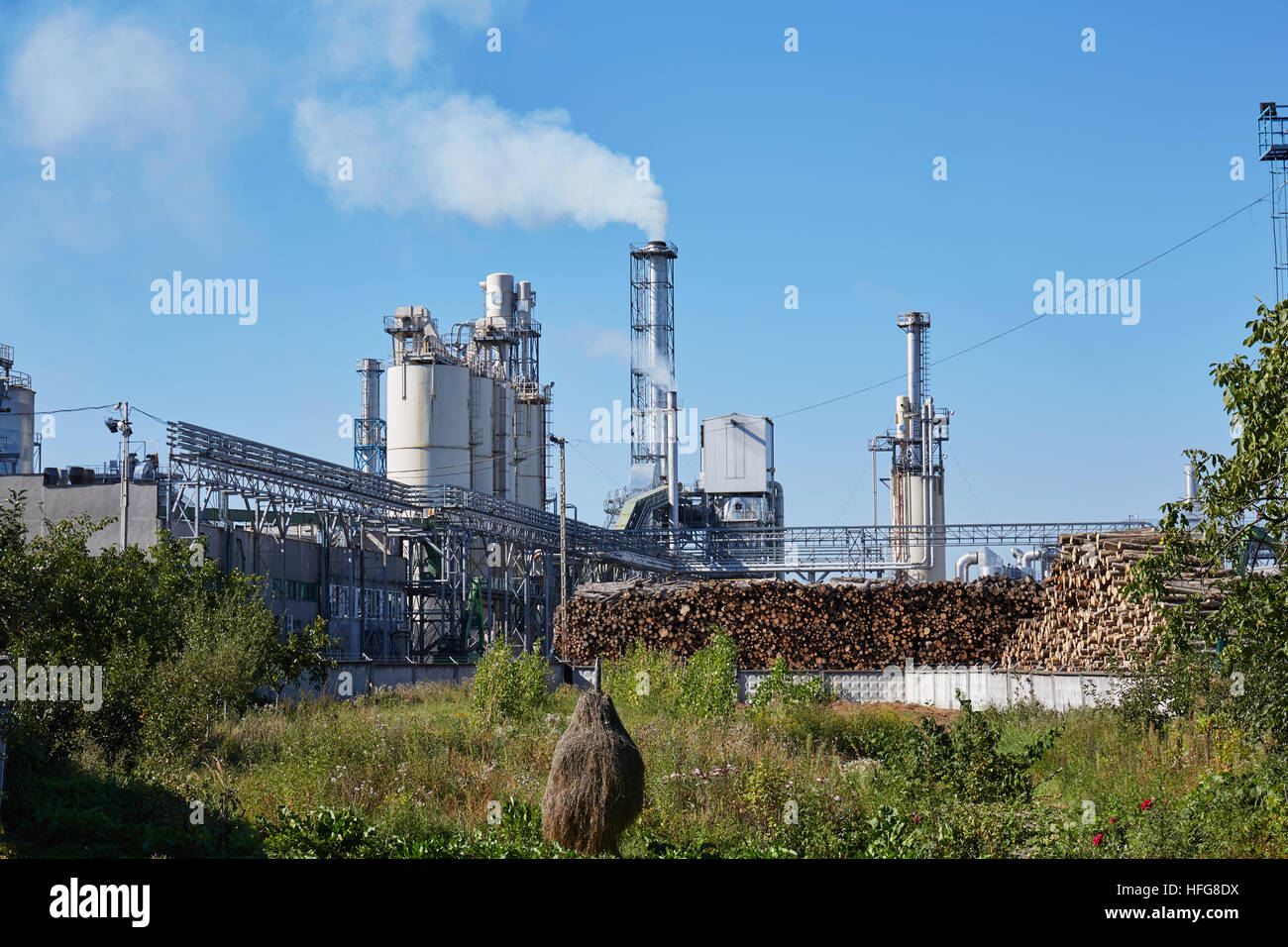 Factory with smoking chimneys hi-res stock photography and images - Alamy