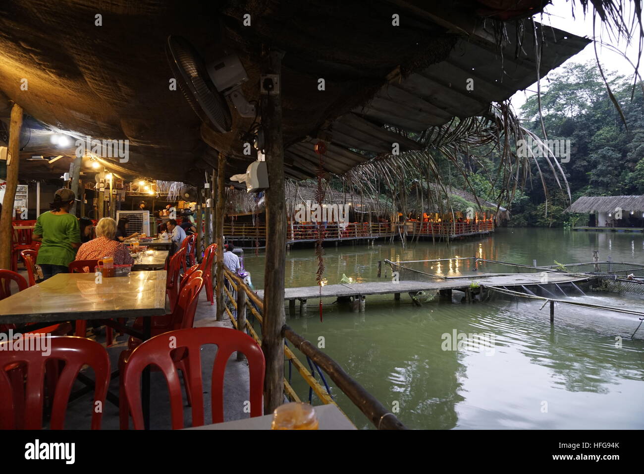 restaurant on a pond in Malaysia Stock Photo - Alamy