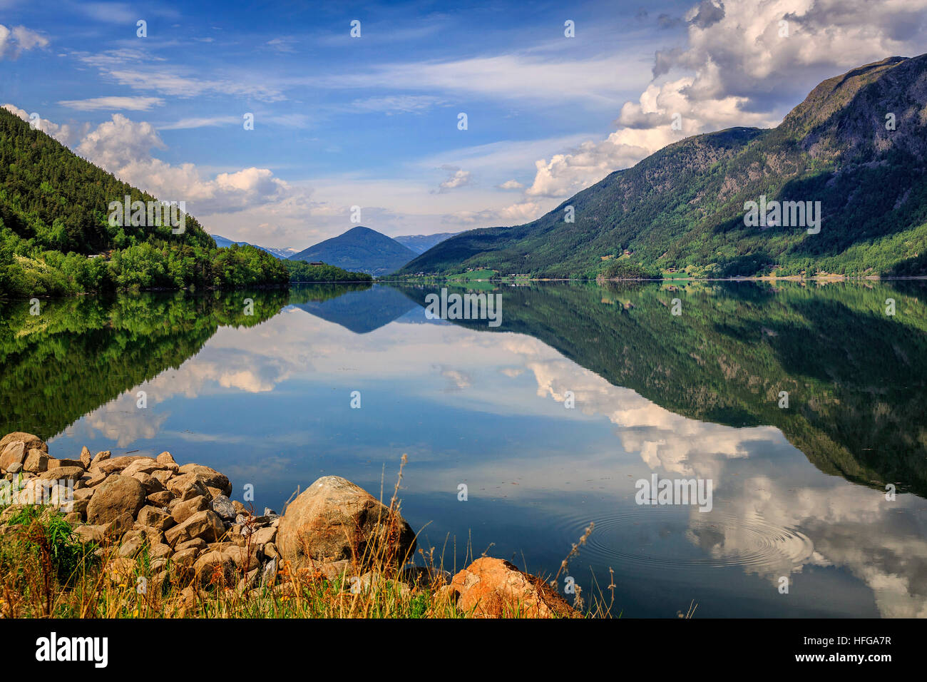 The almost perfect mirror reflections of a beautiful landscape in ...