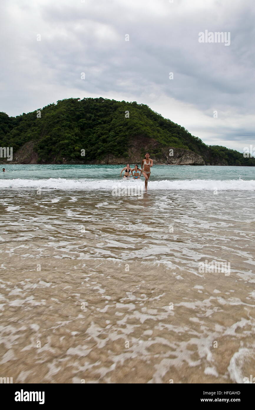 Women Running In The Ocean Stock Photo - Alamy