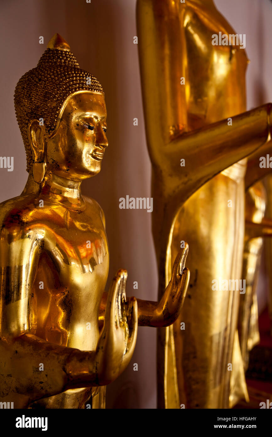 Sitting and standing buddha statues hi-res stock photography and images ...