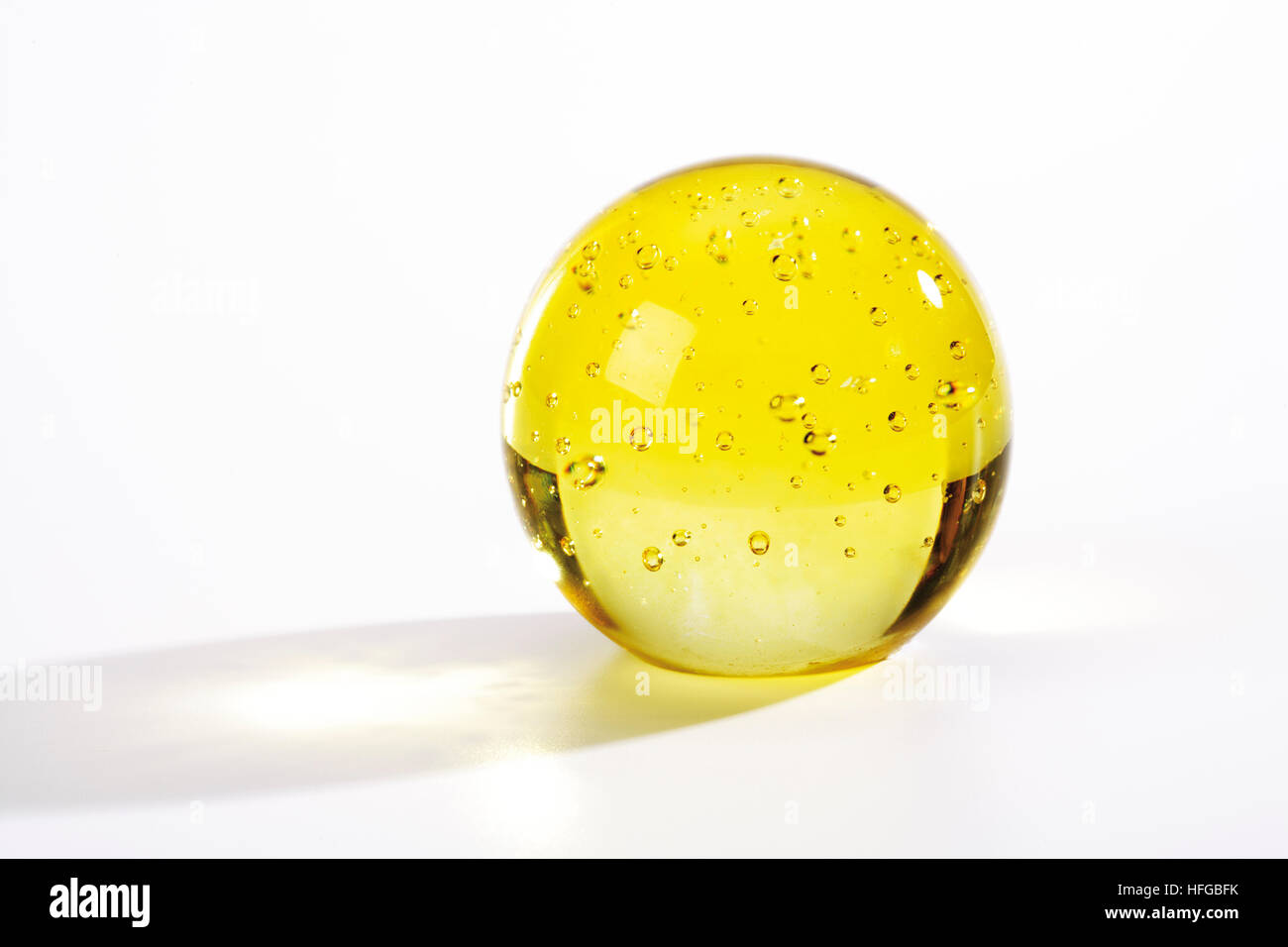 Single yellow glass marble hi-res stock photography and images - Alamy