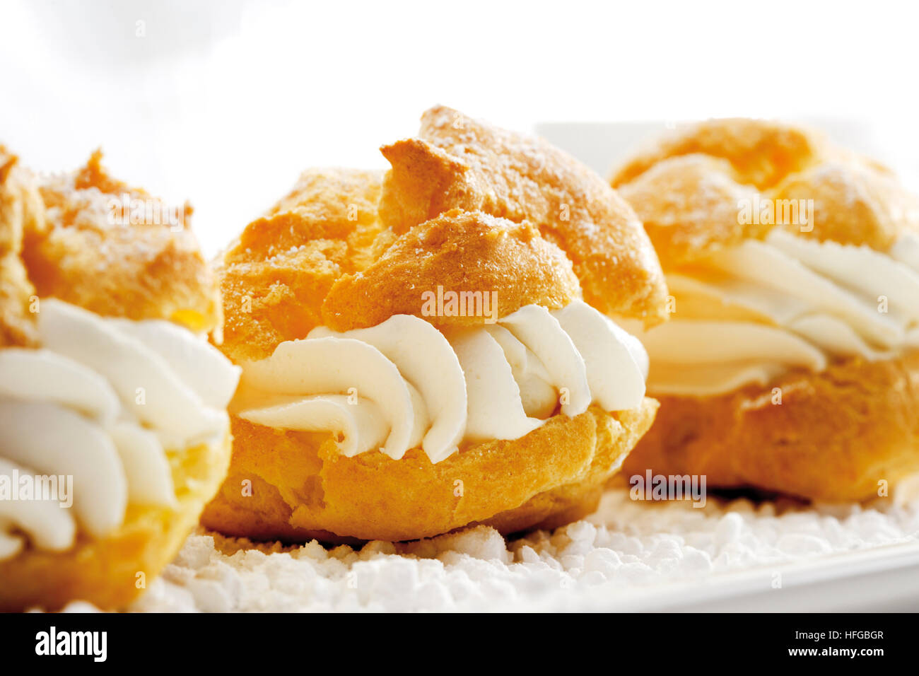 Three cream puffs hi-res stock photography and images - Alamy