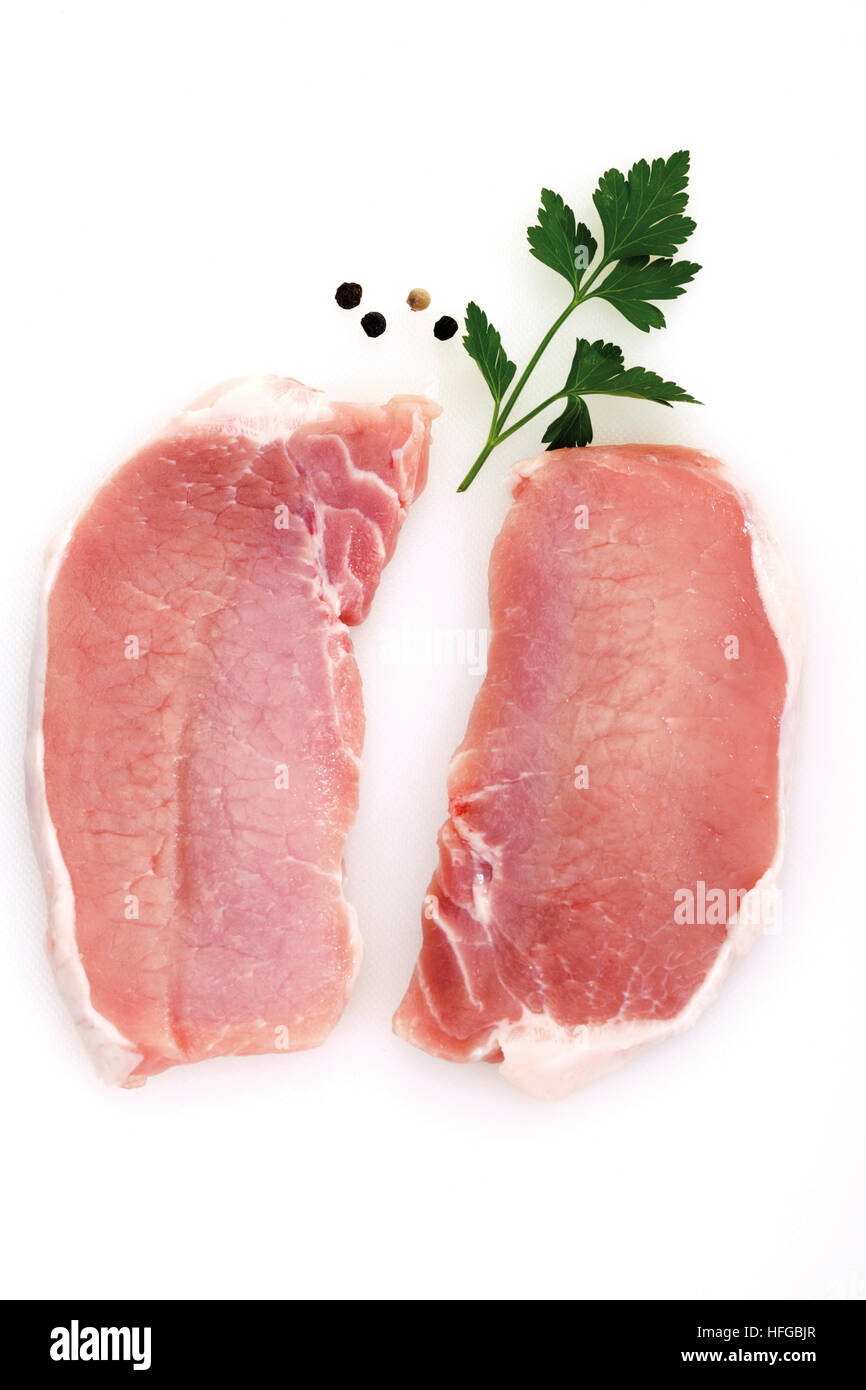 Raw pork cutlets Stock Photo - Alamy