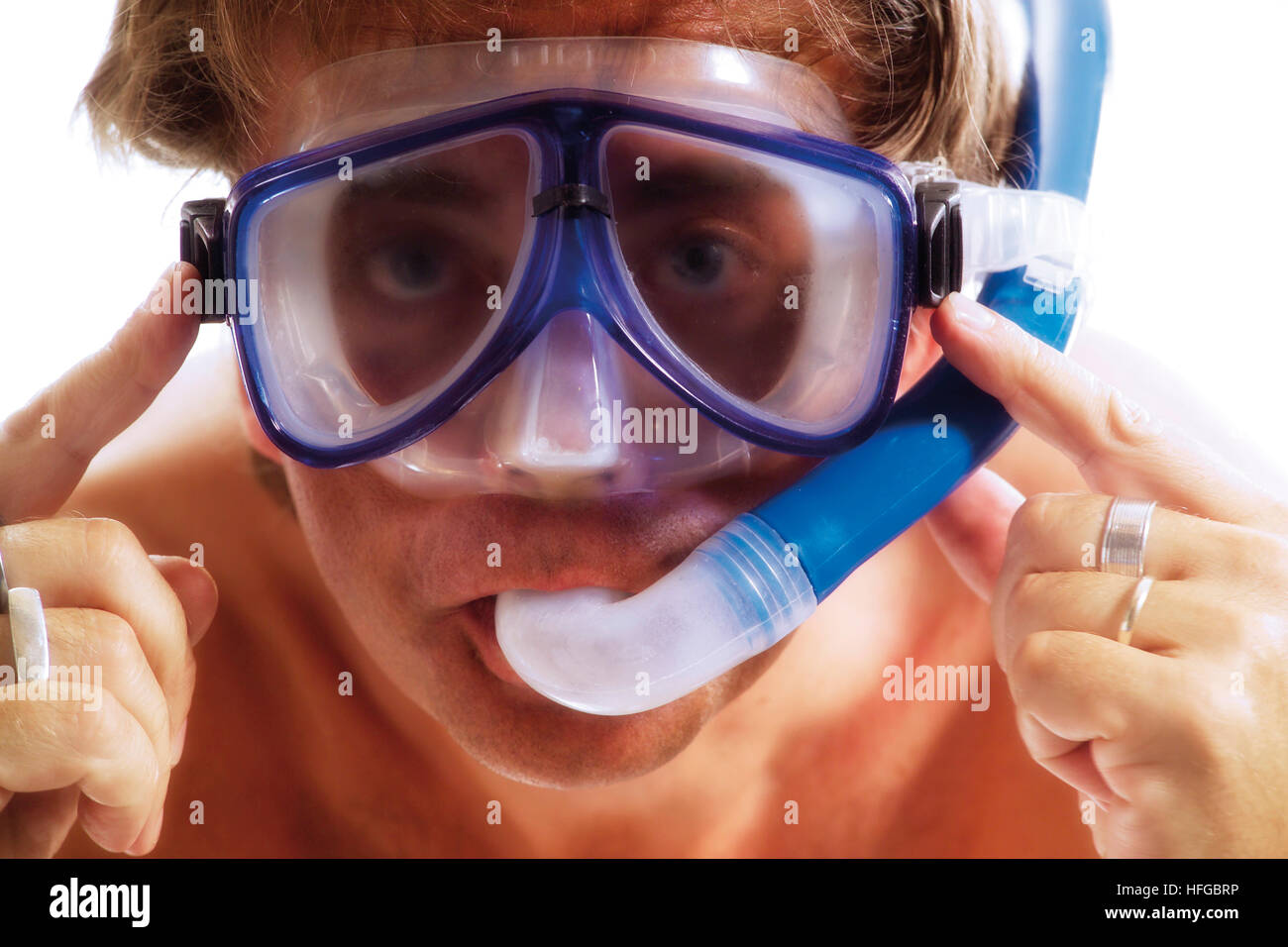 Young man wearing diving goggles and snorkel Stock Photo - Alamy
