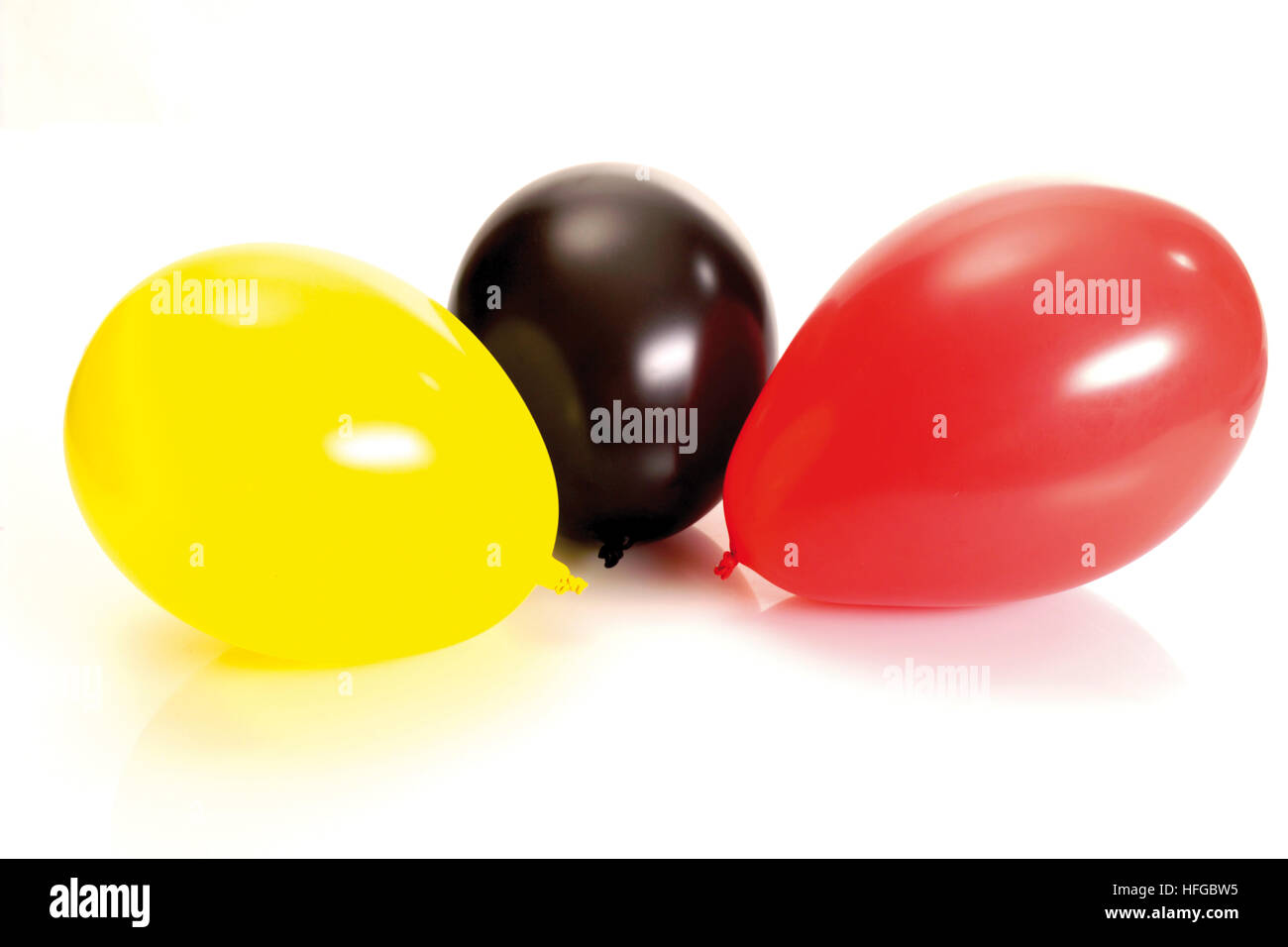 Three balloons, German national colours Stock Photo - Alamy