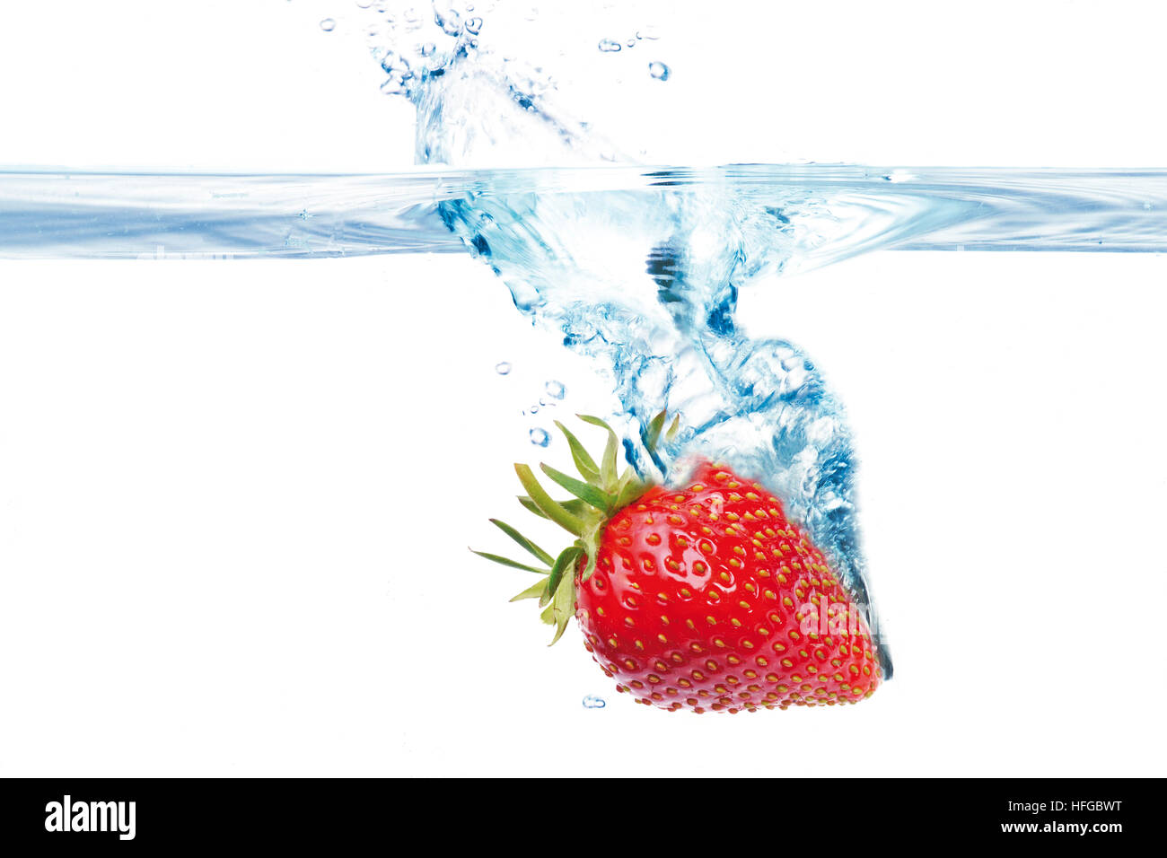 Strawberry dunked into water (splash Stock Photo - Alamy