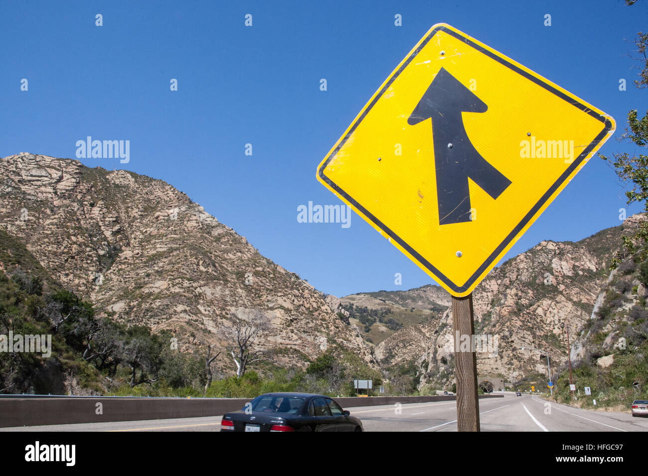 Merging road sign hi-res stock photography and images - Alamy