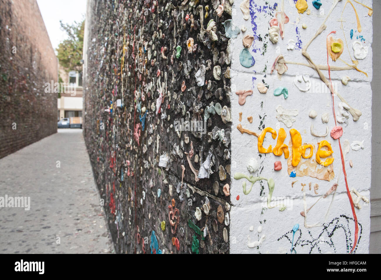 Close up of narrow path wall covered in chewing gum, Bubblegum Alley, a ...