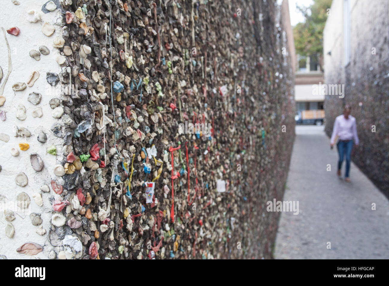 Close up of narrow path wall covered in chewing gum, Bubblegum Alley, a ...