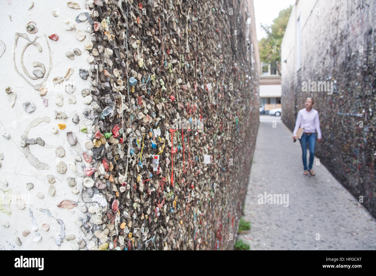 Close up of narrow path wall covered in chewing gum, Bubblegum Alley, a ...
