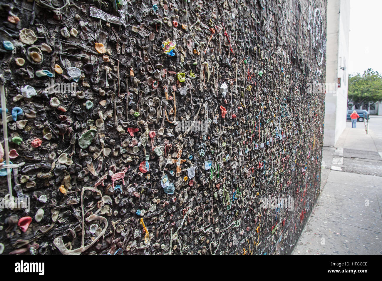 Close up of narrow path wall covered in chewing gum, Bubblegum Alley, a ...