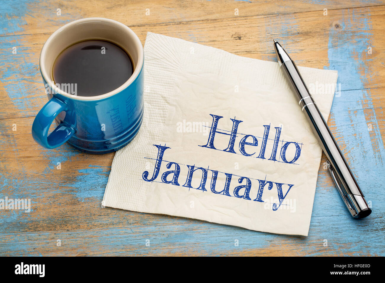 Hello January - handwriting on a napkin with a cup of coffee Stock ...