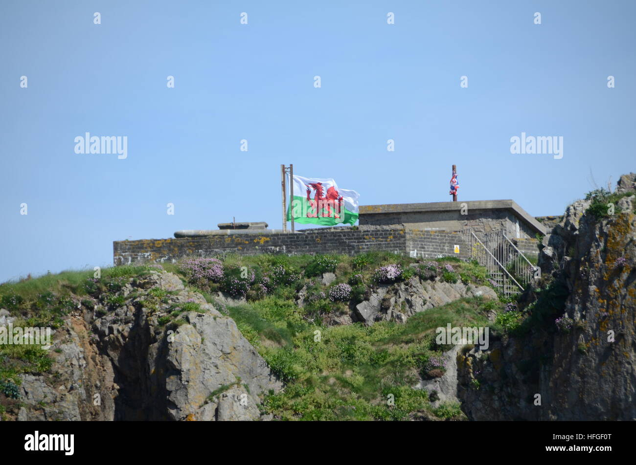 The Welsh Flag flies proudly on St. Catherine's Island in Tenby ...