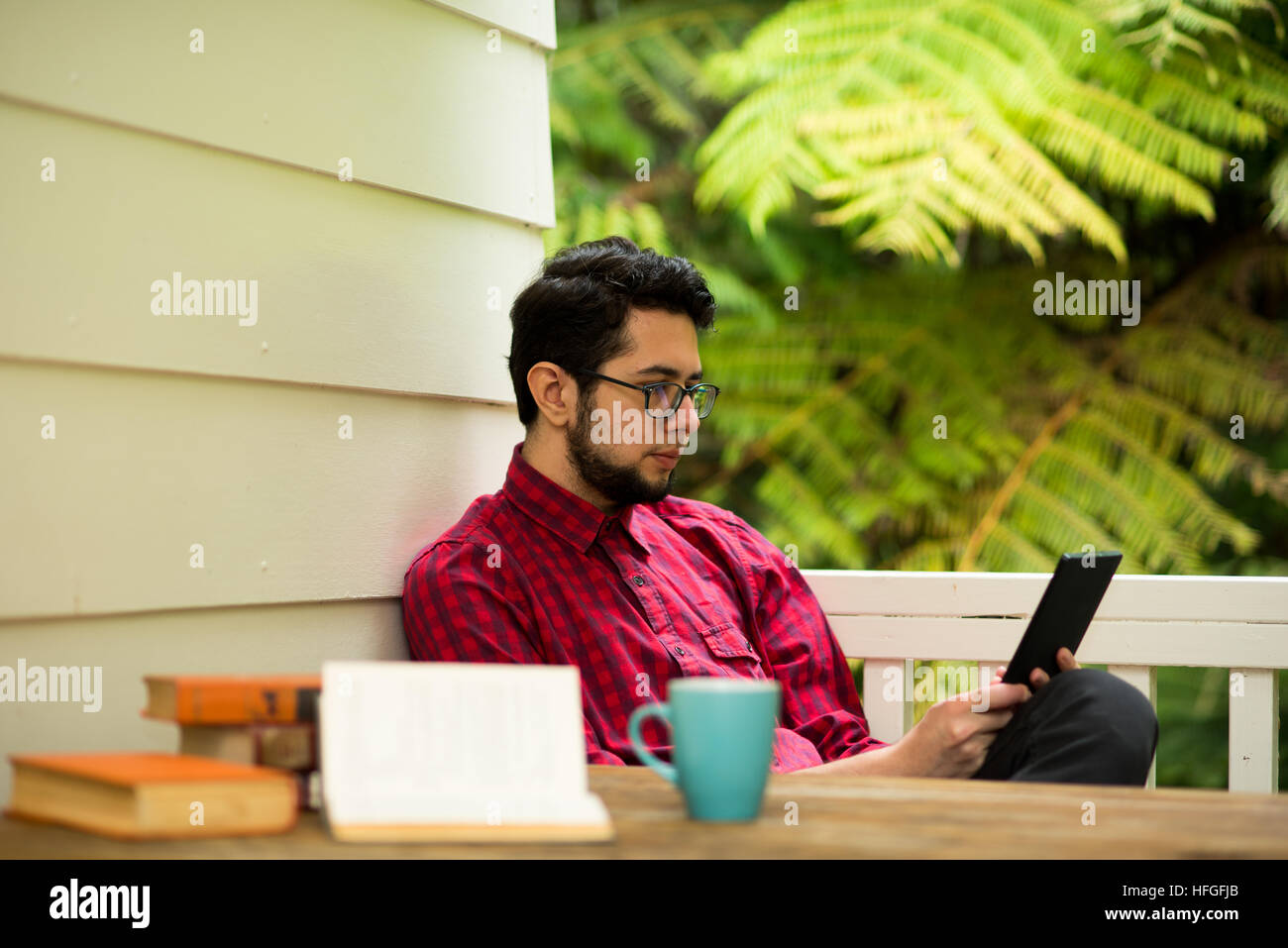 Modern casual man sitting outdoor hi-res stock photography and images - Alamy