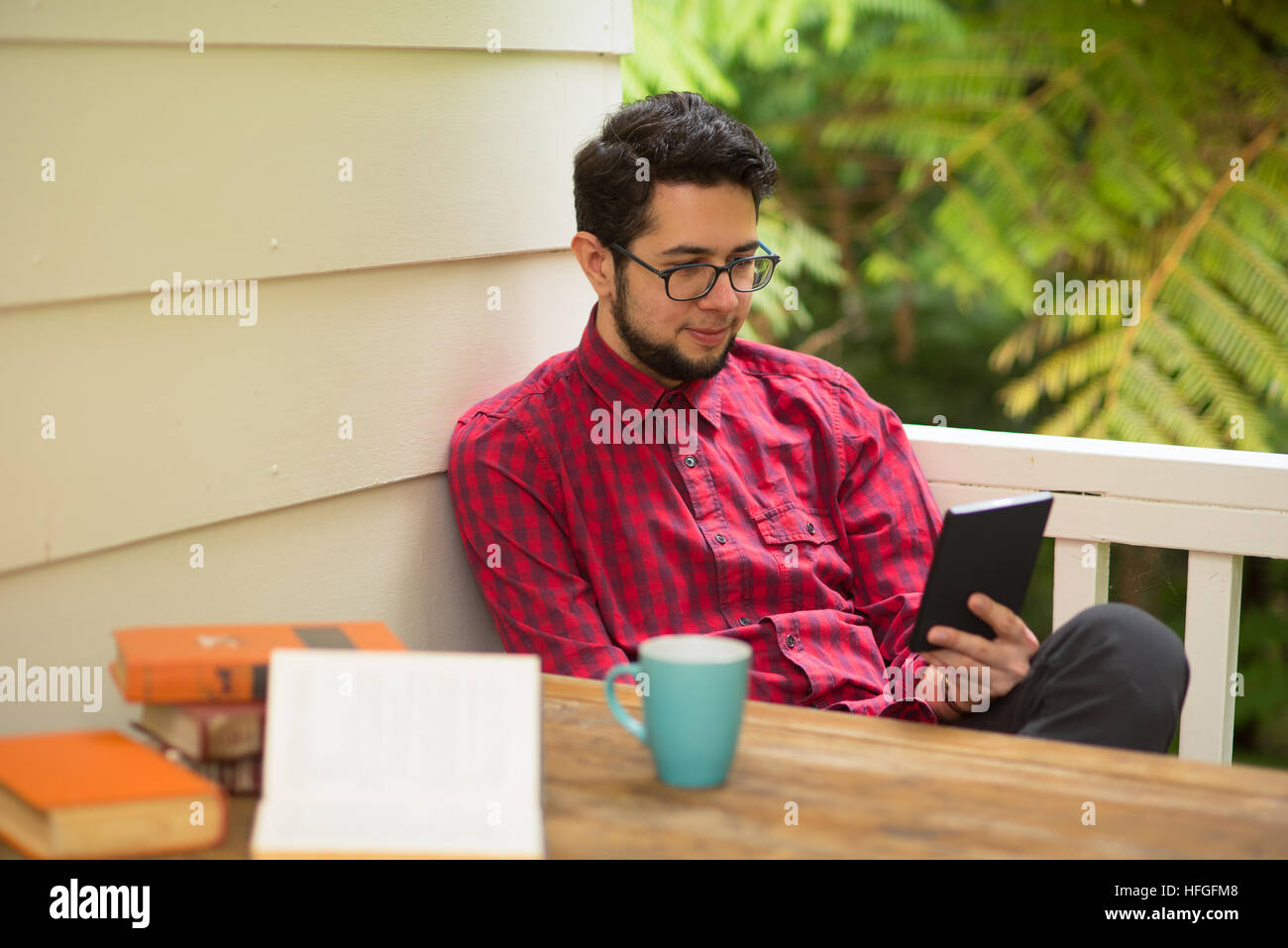 Modern casual man sitting outdoor hi-res stock photography and images - Alamy