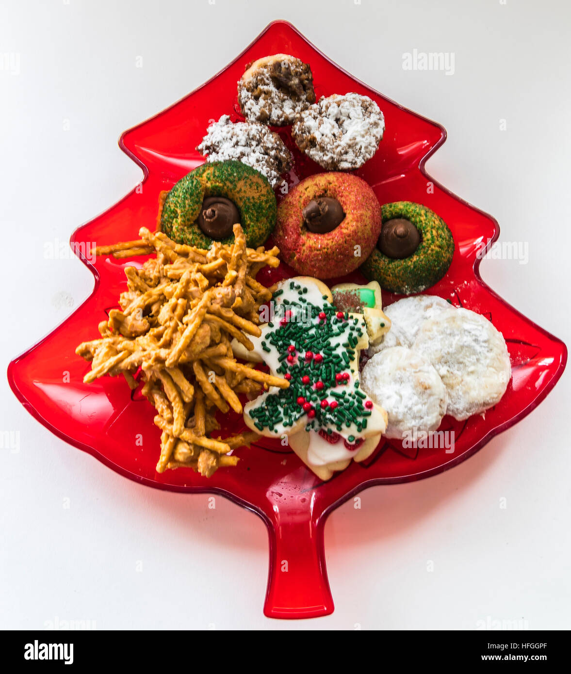 red christmas tree shaped candy dish & christmas cookies Stock Photo ...