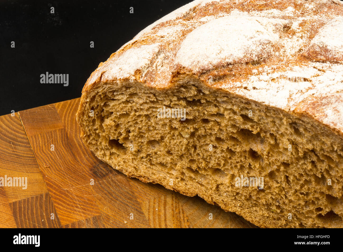 cut malt bread handmade on wooden background Stock Photo - Alamy
