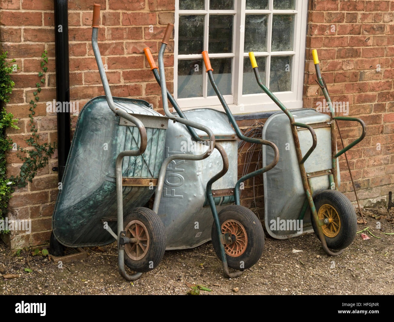 Three wheelbarrows High Resolution Stock Photography and Images - Alamy