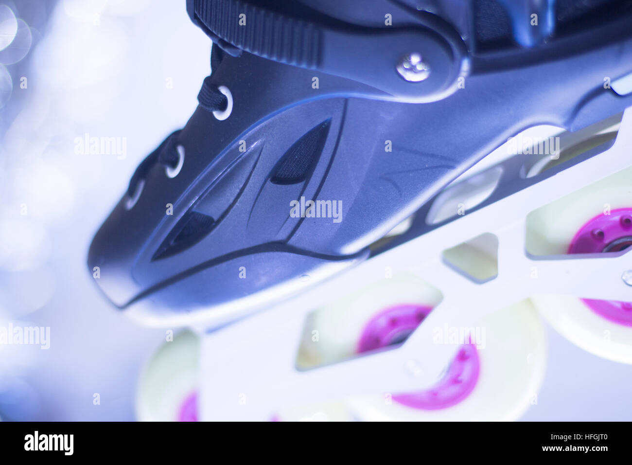 Freestyle inline skates boots and wheels in retail store shop window ...