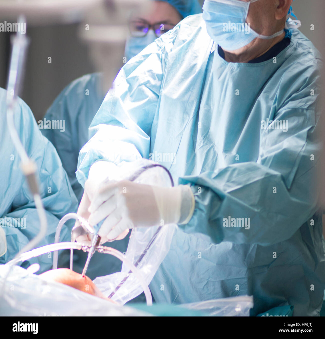 Surgeon in operating theater emergency room surgery in hospital clinic ...