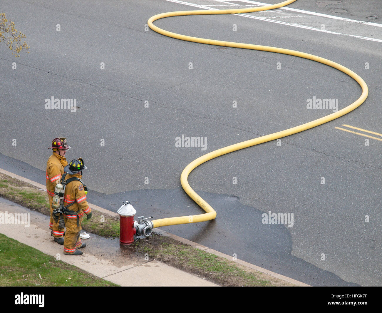 Working Firefighter Tanker Truck Fire Stock Photo - Alamy