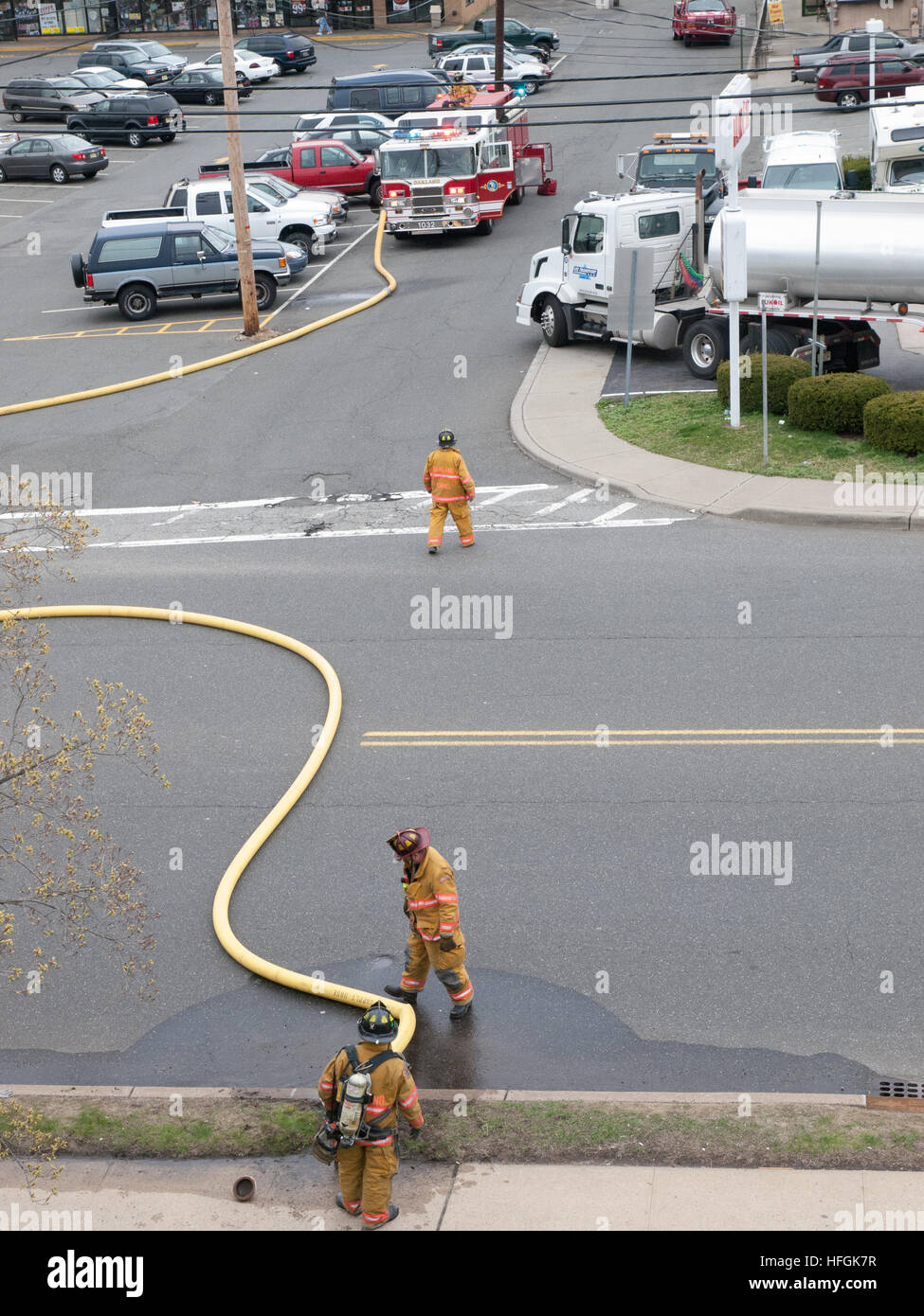 Working Firefighter Tanker Truck Fire Stock Photo - Alamy