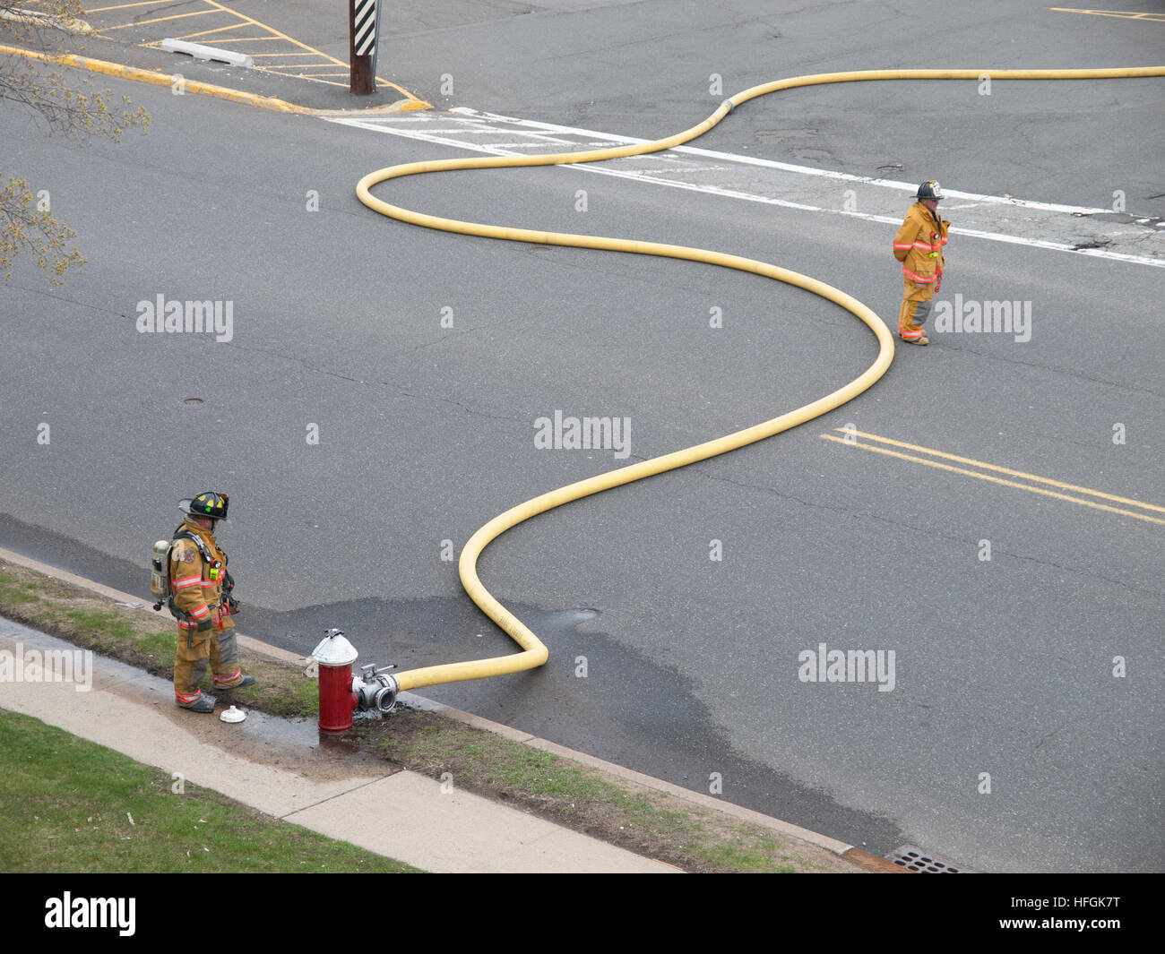 Working Firefighter Tanker Truck Fire Stock Photo - Alamy