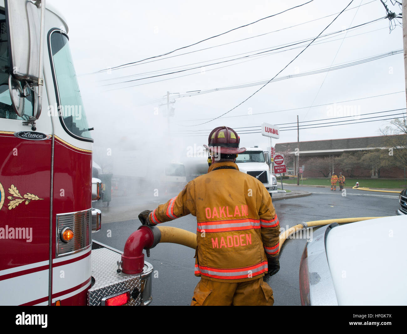 Working Firefighter Tanker Truck Fire Stock Photo - Alamy