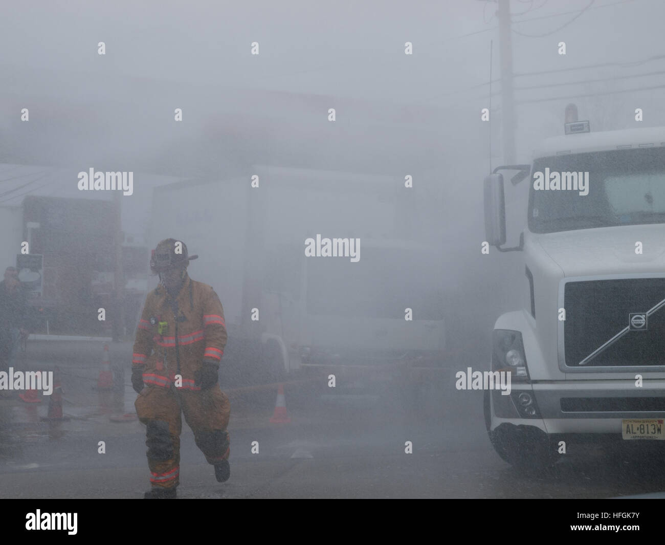Working Firefighter Tanker Truck Fire Stock Photo - Alamy