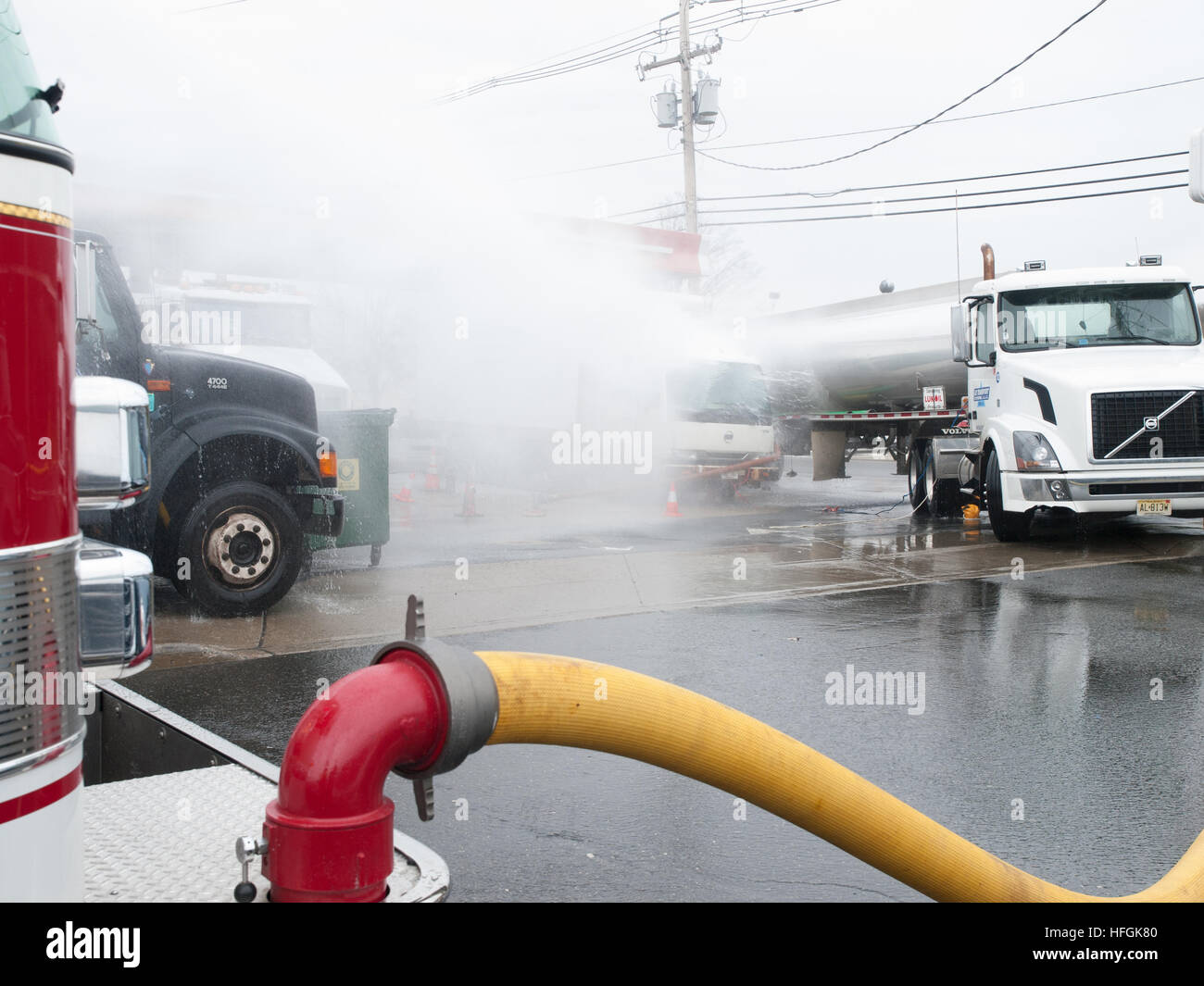 Working Firefighter Tanker Truck Fire Stock Photo - Alamy