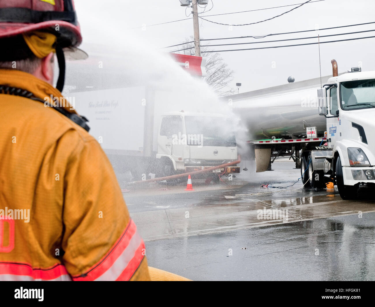 Working Firefighter Tanker Truck Fire Stock Photo - Alamy