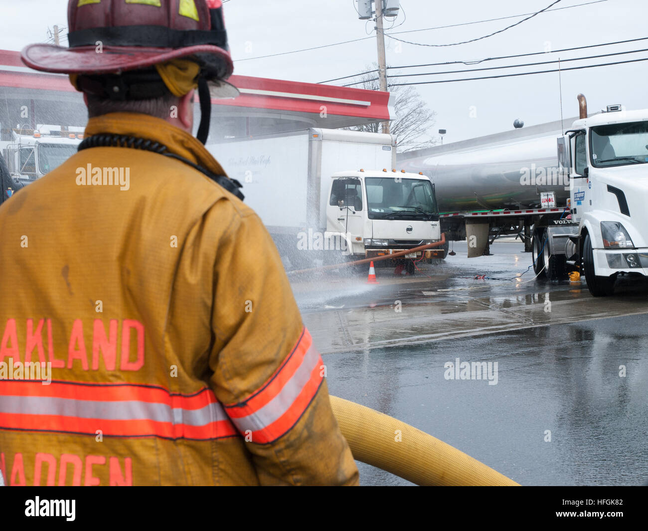 Working Firefighter Tanker Truck Fire Stock Photo - Alamy