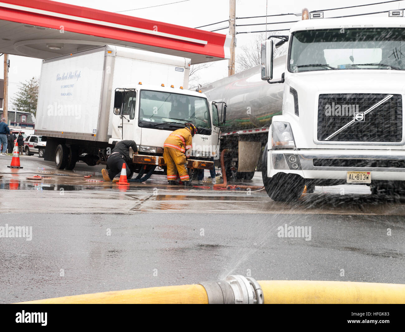 Working Firefighter Tanker Truck Fire Stock Photo - Alamy